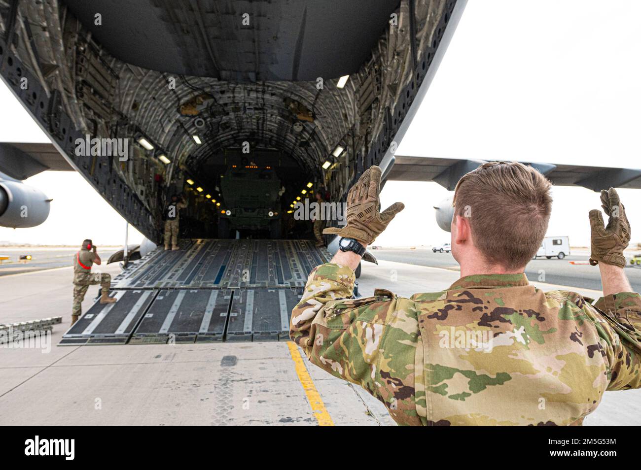 U.S. Air Force Airman 1st Class Derek Keller, an aircraft loadmaster ...