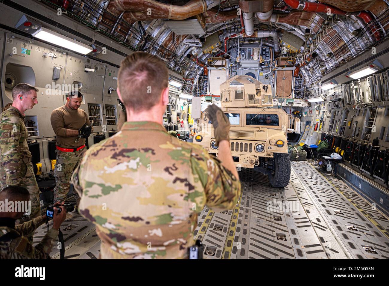 U.S. Air Force Airman 1st Class Derek Keller, an aircraft loadmaster ...