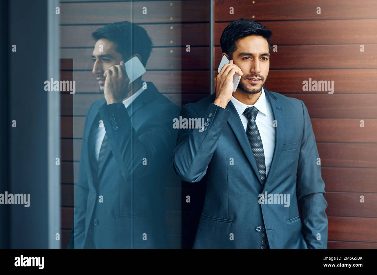 Focus on the needs of your customers. a businessman taking a call ...