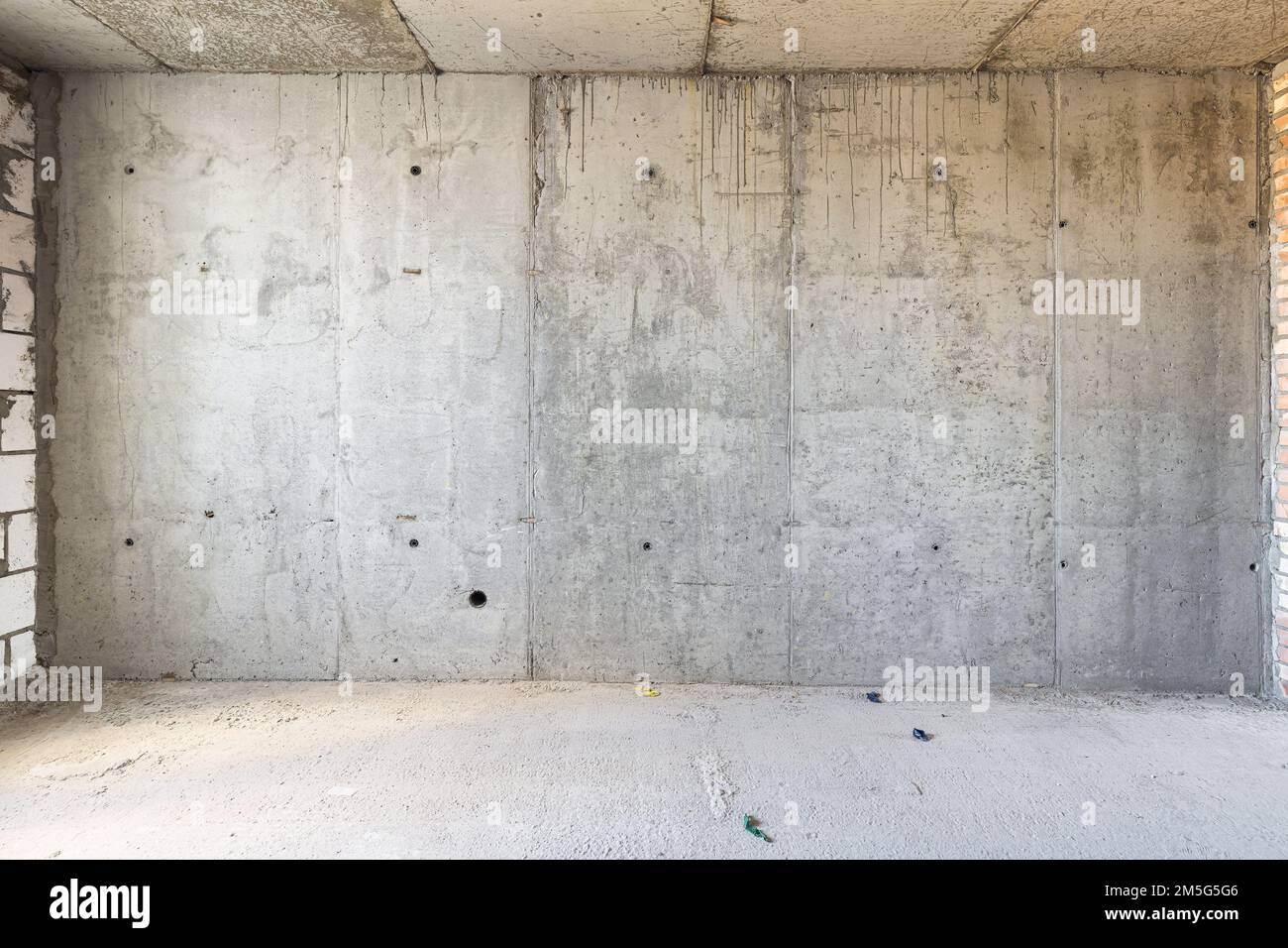 Empty concrete commercial space without finishing with partitions Stock ...