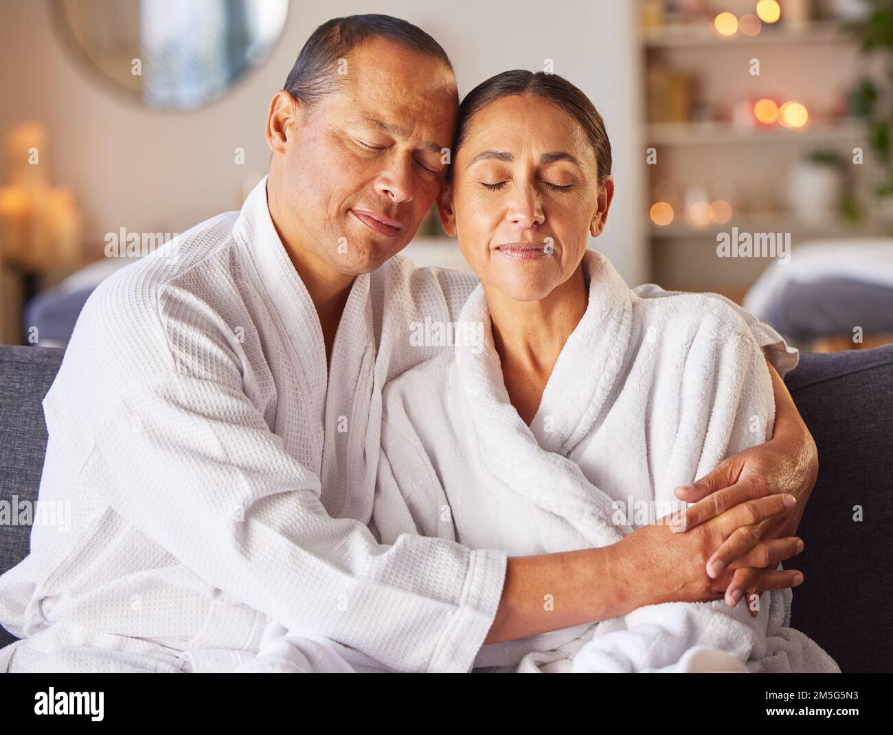 Hug, relax and mature couple at a spa with zen, calm and stress free ...