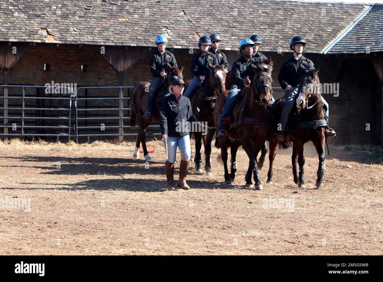 Lara Armstrong keeps pace with the horses as the Half Section Soldiers ...