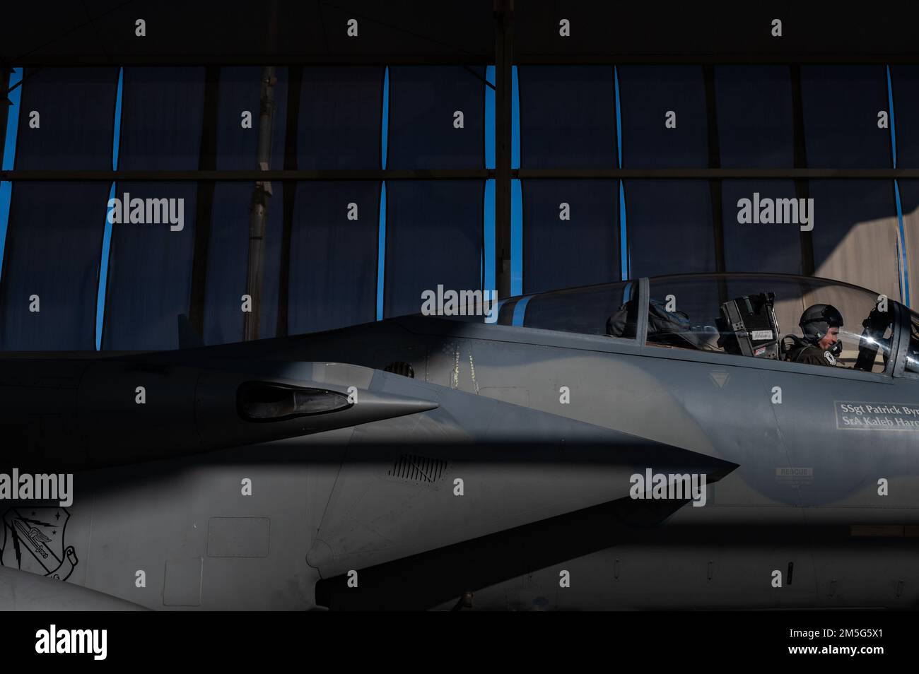 A pilot from the 57th Wing, prepares to taxi for takeoff in an F-15C ...