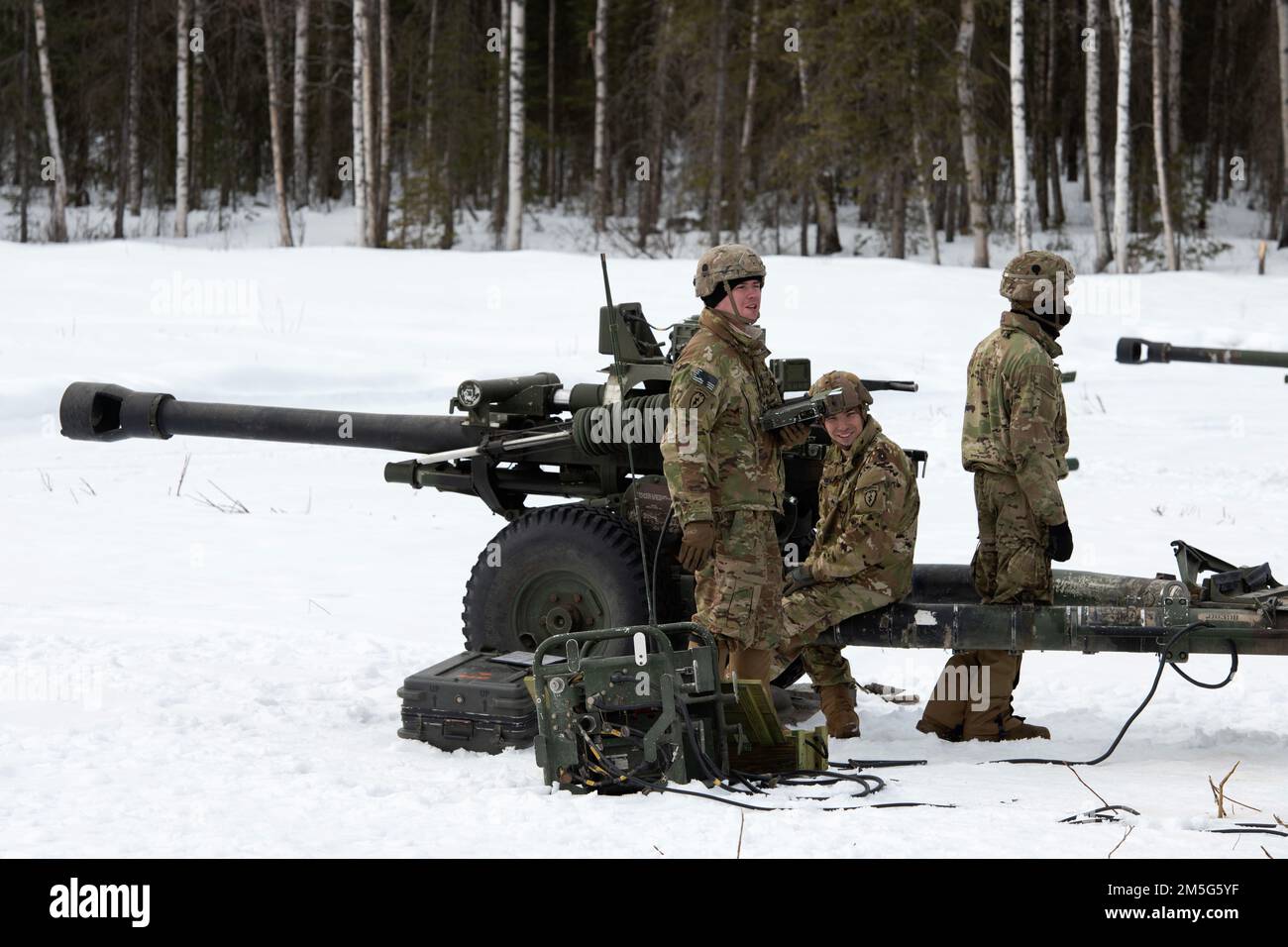 U.S. Army paratroopers assigned to Bravo Battery, 2nd Battalion, 377th Parachute Field Artillery ...