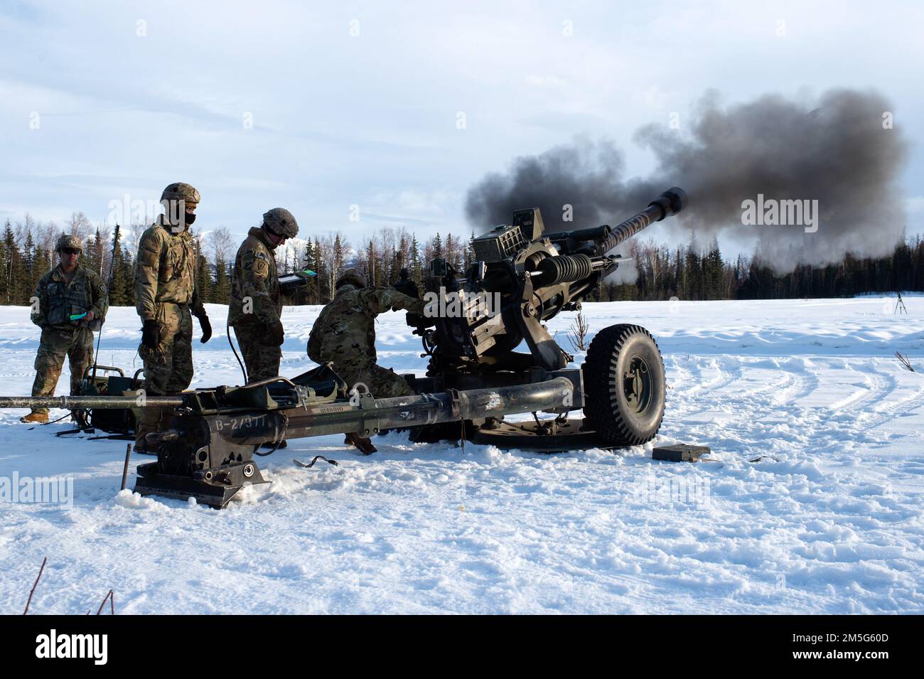 U.S. Army paratroopers assigned to Bravo Battery, 2nd Battalion, 377th Parachute Field Artillery ...
