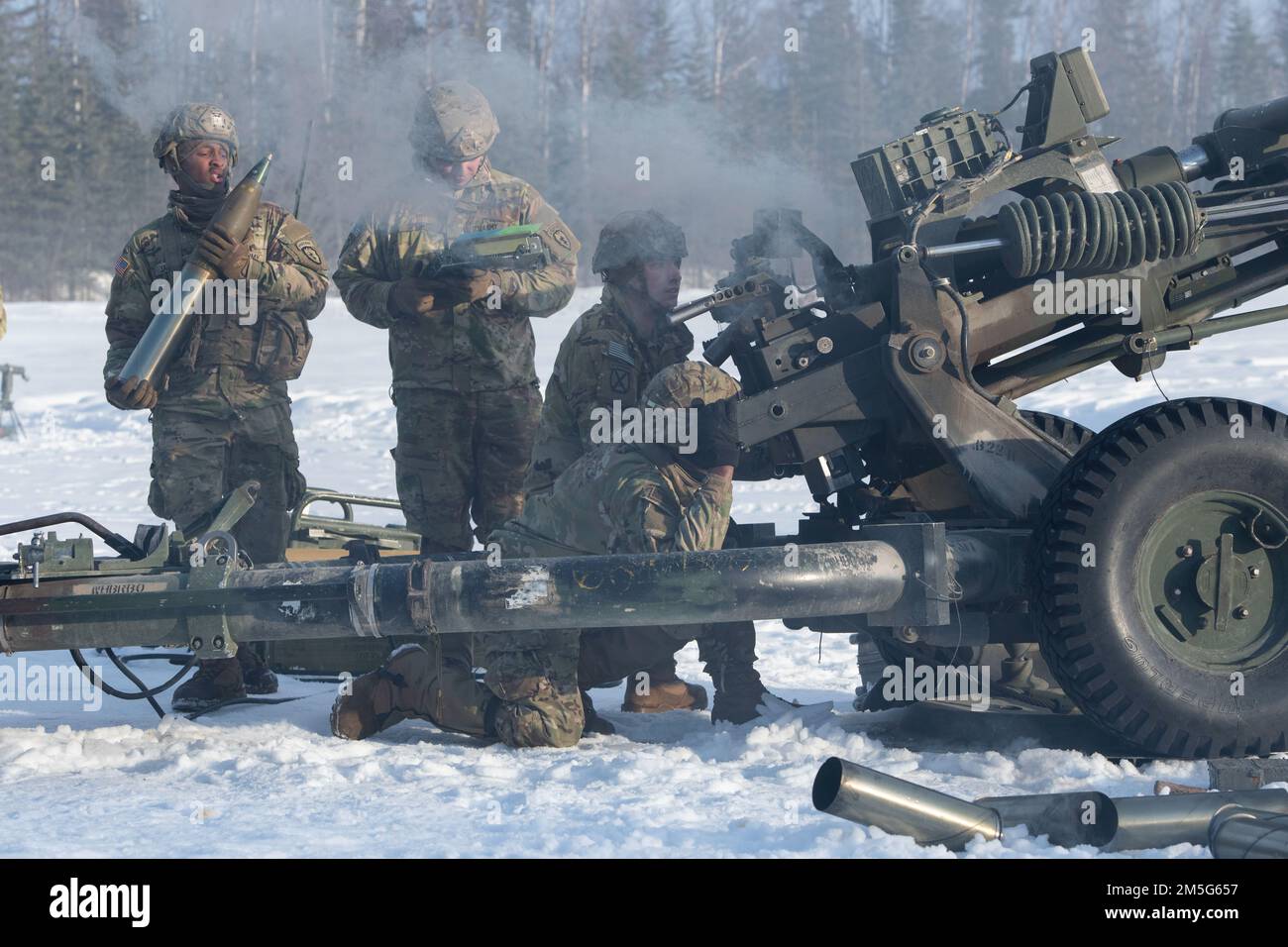 U.S. Army paratroopers assigned to Bravo Battery, 2nd Battalion, 377th Parachute Field Artillery ...