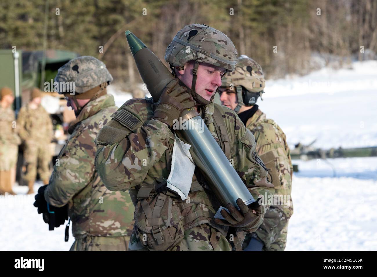 A U.S. Army paratrooper assigned to Bravo Battery, 2nd Battalion, 377th Parachute Field ...