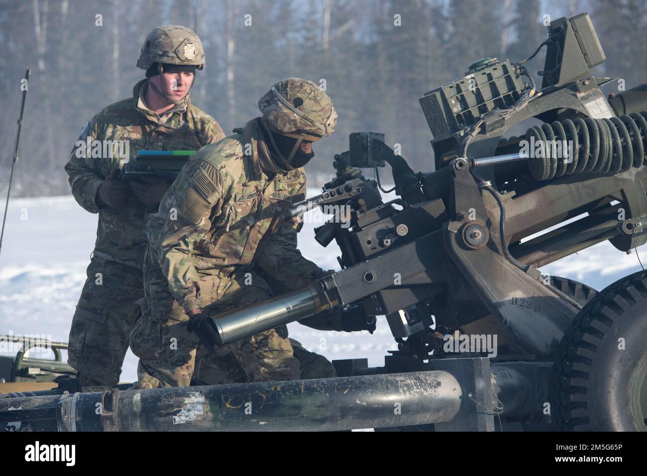 U.S. Army paratroopers assigned to Bravo Battery, 2nd Battalion, 377th Parachute Field Artillery ...