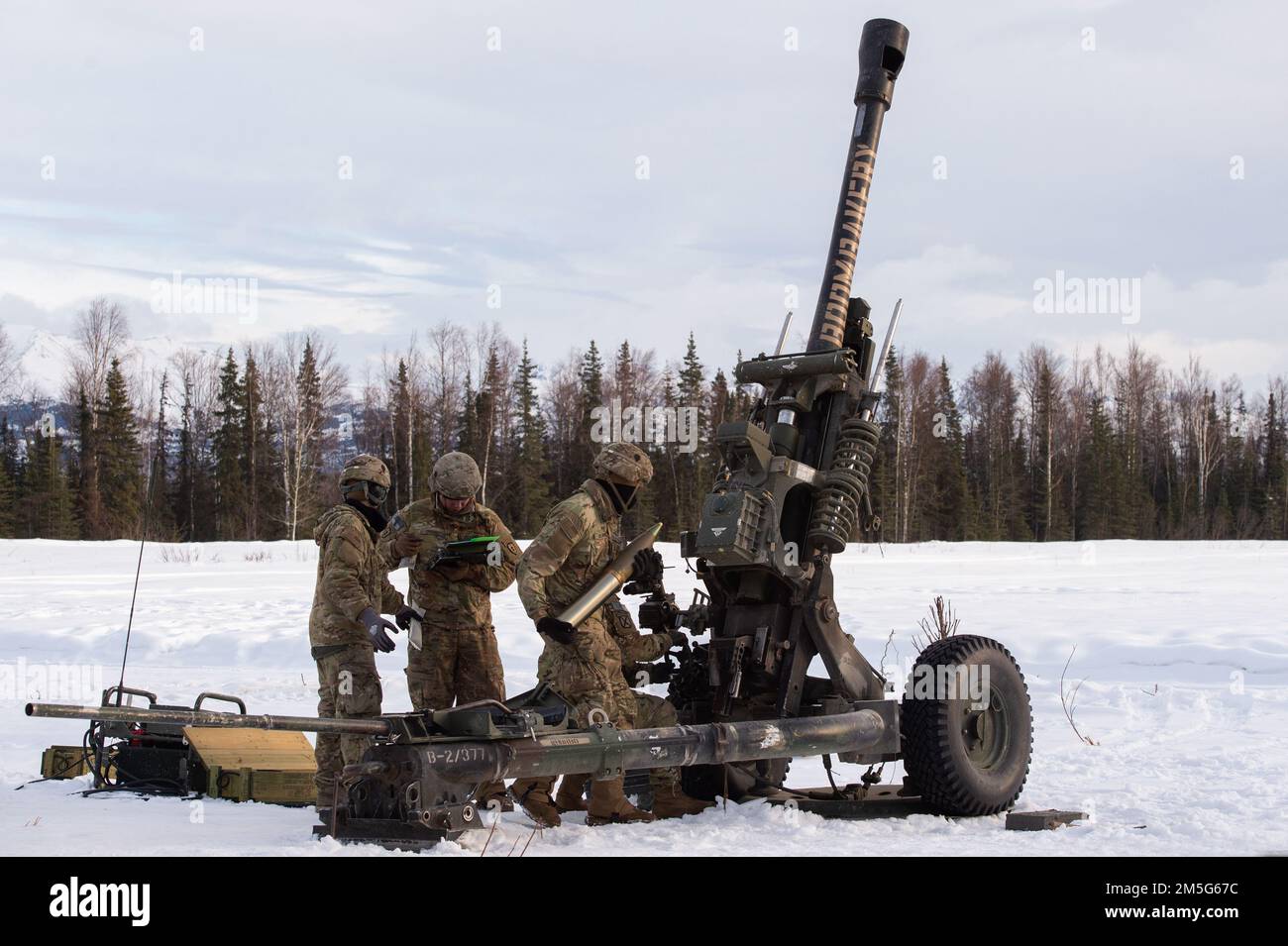 U.S. Army paratroopers assigned to Bravo Battery, 2nd Battalion, 377th Parachute Field Artillery ...