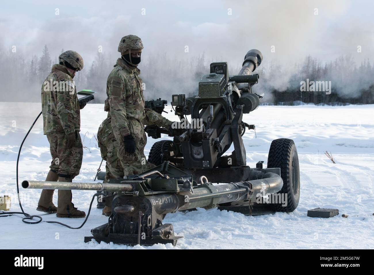 U.S. Army paratroopers assigned to Bravo Battery, 2nd Battalion, 377th Parachute Field Artillery ...