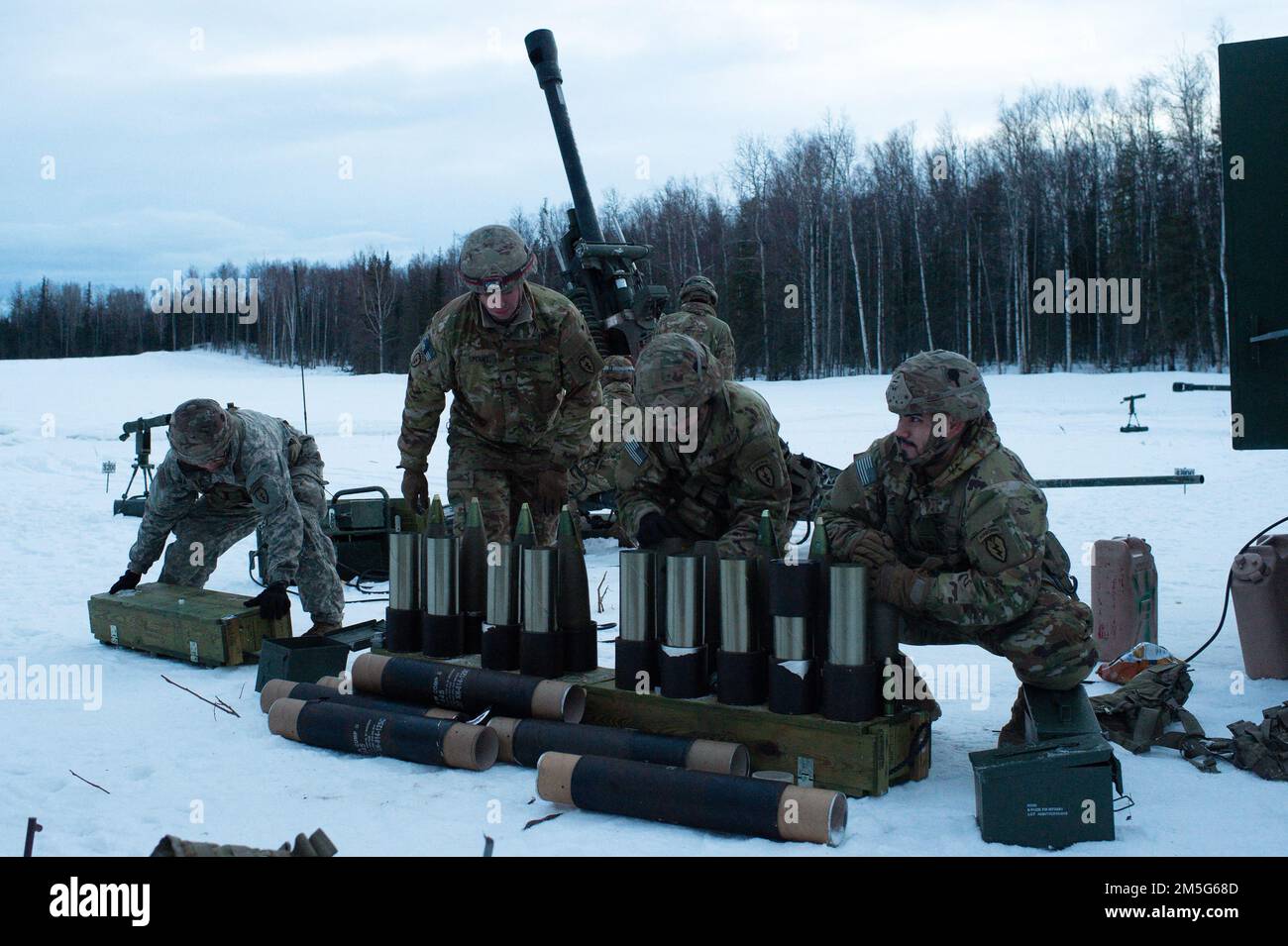 U.S. Army paratroopers assigned to Bravo Battery, 2nd Battalion, 377th Parachute Field Artillery ...