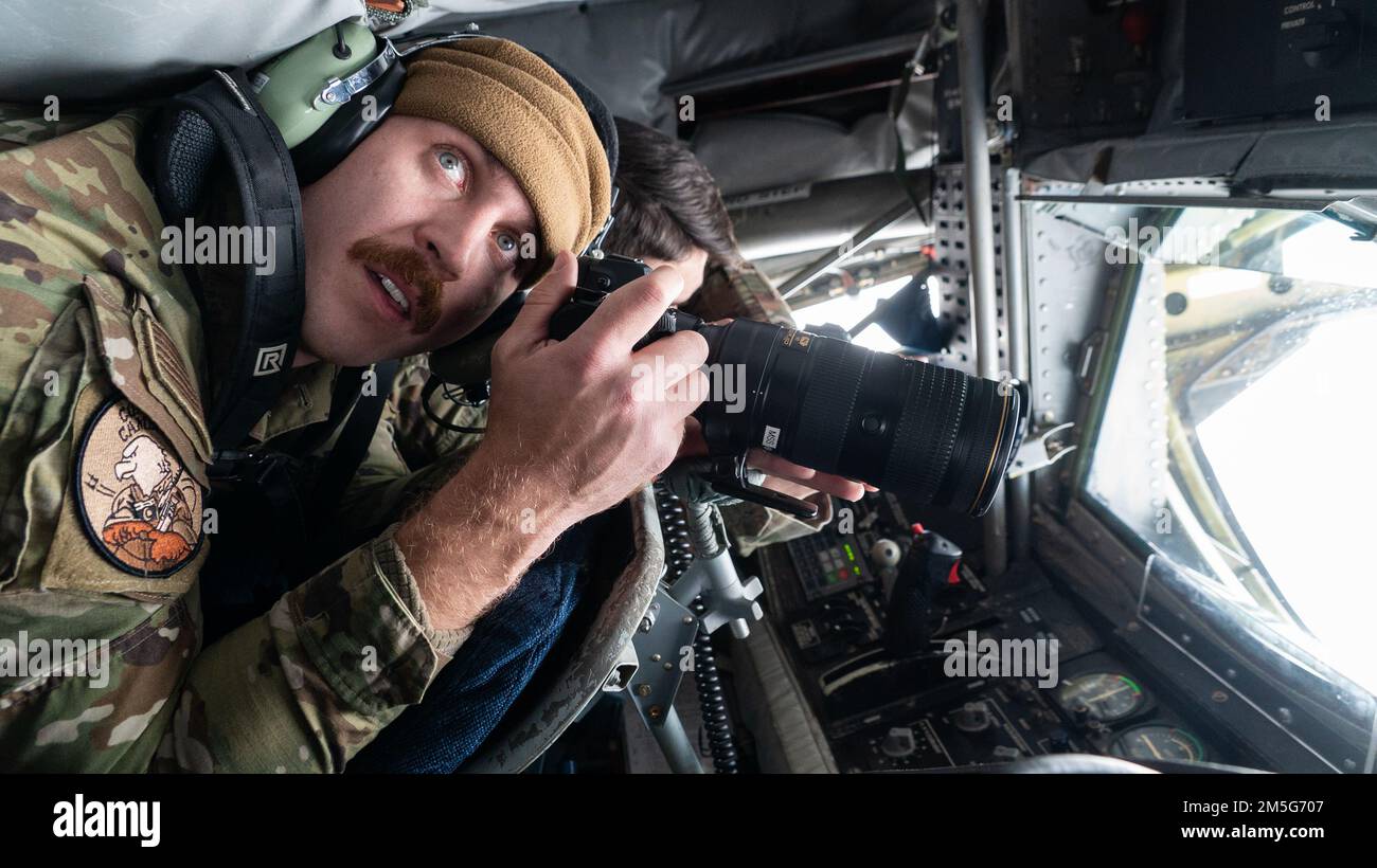 U.S. Air Force Senior Airman Joseph LeVeille looks up from taking a ...