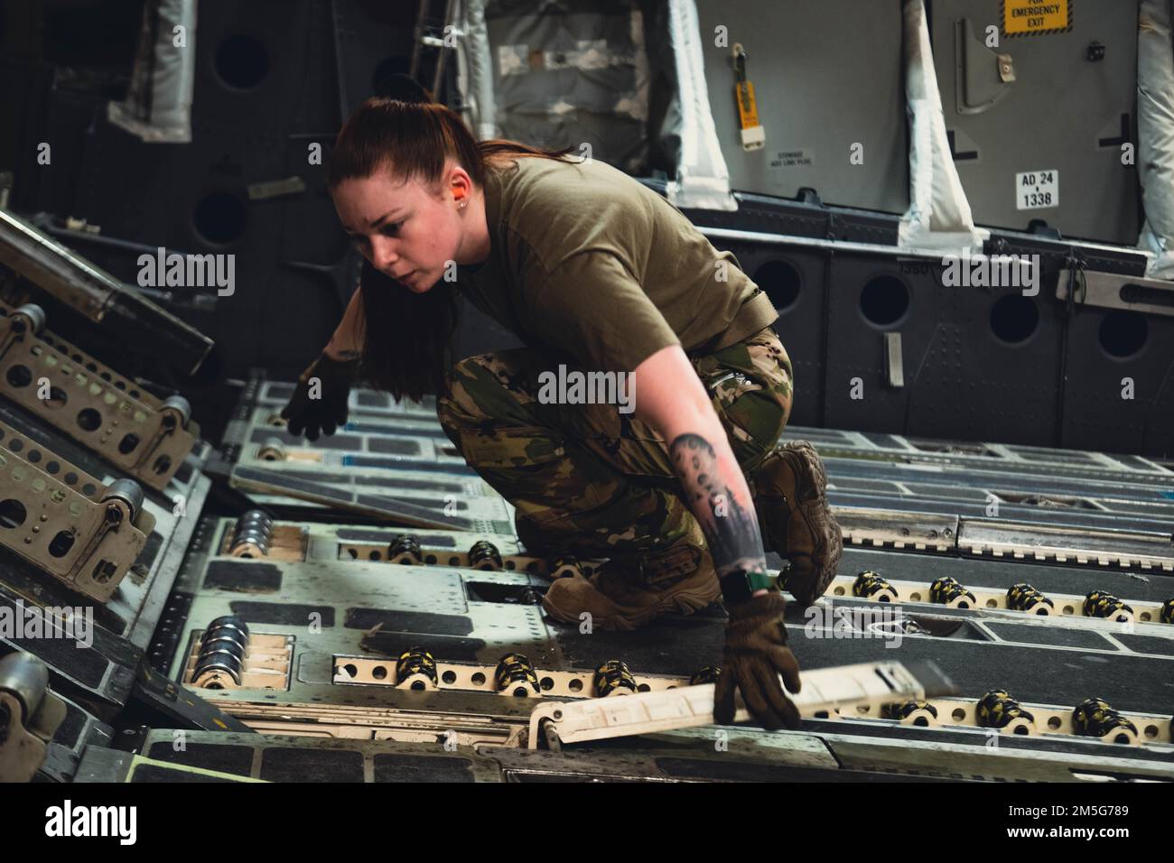 A U.S. Air Force C-17 Globemaster III aircraft loadmaster assigned to ...
