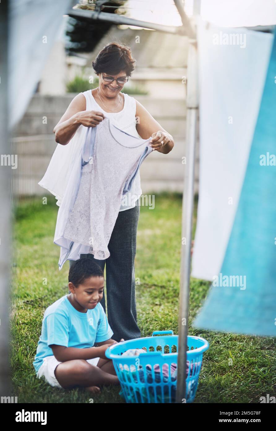 Hea always willing to help with housework. a grandmother and her ...