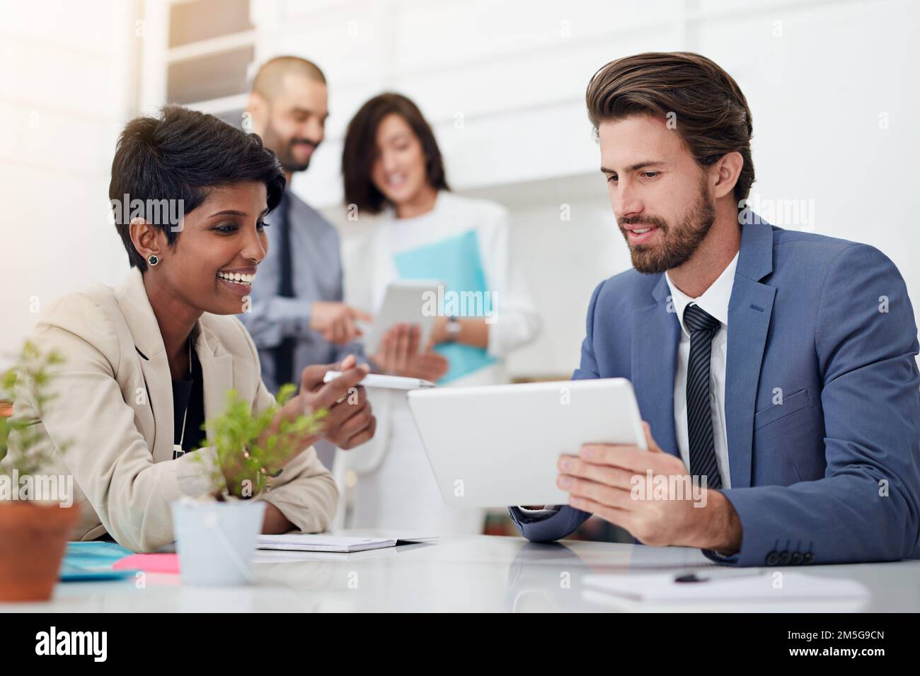 Happy man in office reviewing hi-res stock photography and images - Alamy