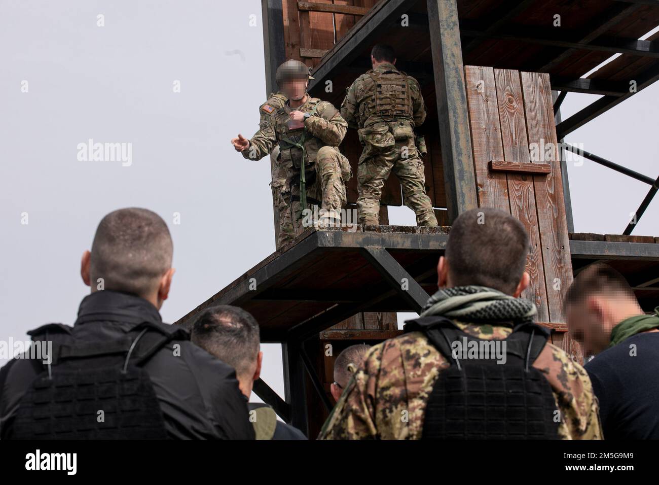 Members of 10th Special Forces Group give instructions on tactical ...