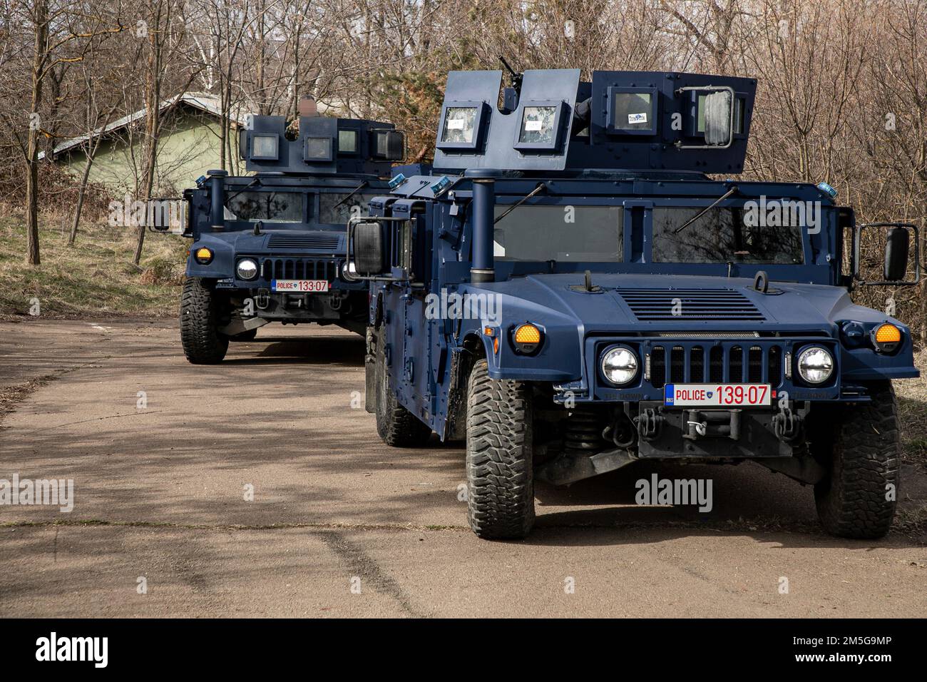 Members of Kosovo Special Intervention Unit drive Humvees for tactical ...