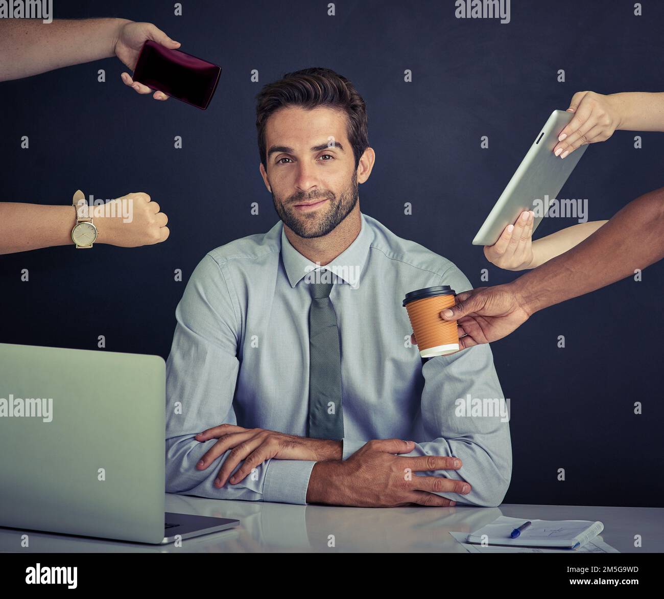 Productivity is the key to success. Portrait of a young corporate ...