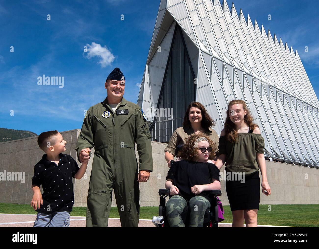Anna Cummins (far right), 16, poses with her family after finding out ...