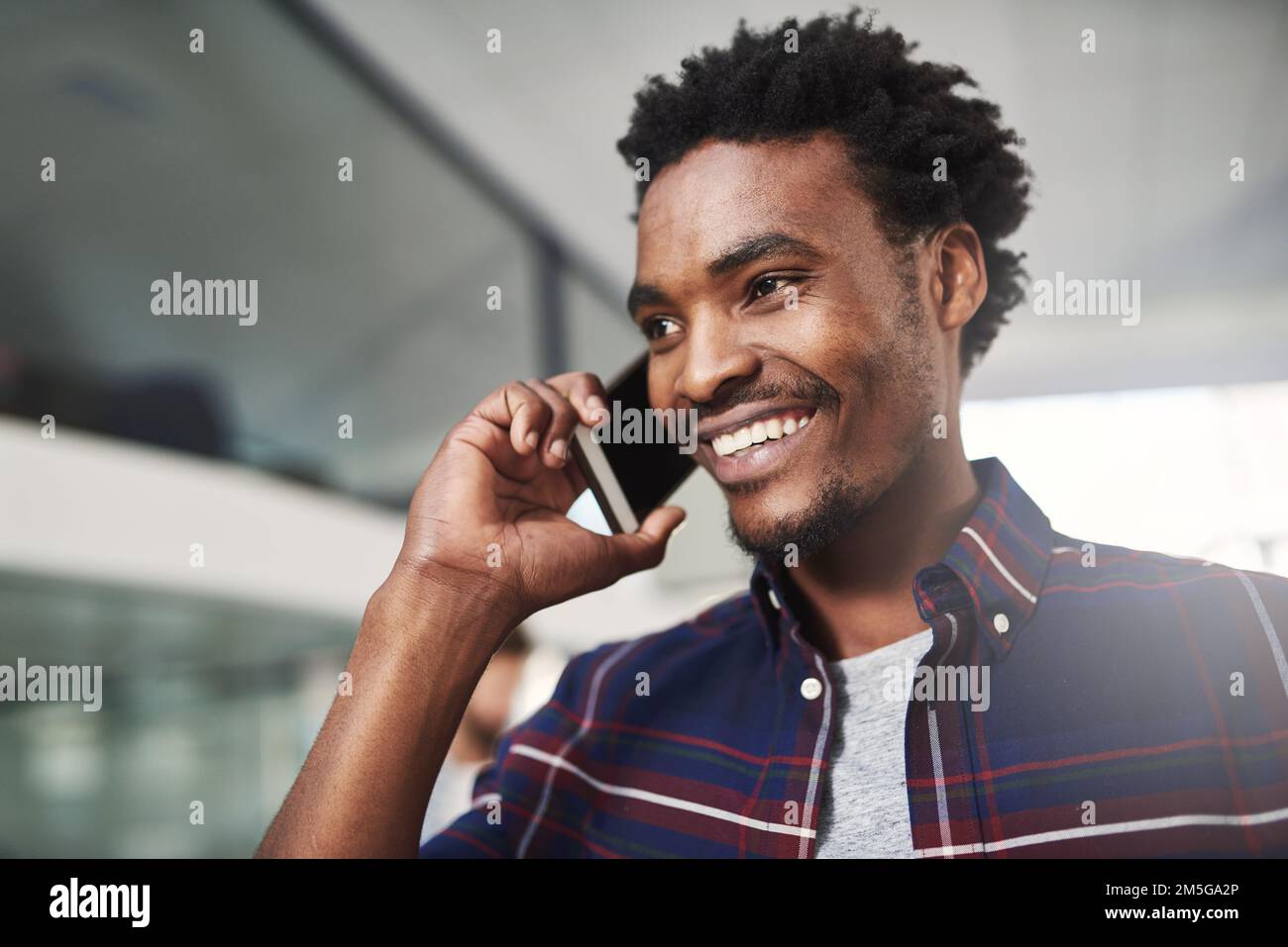 Glad I could be of assistance. a young designer talking on a cellphone ...
