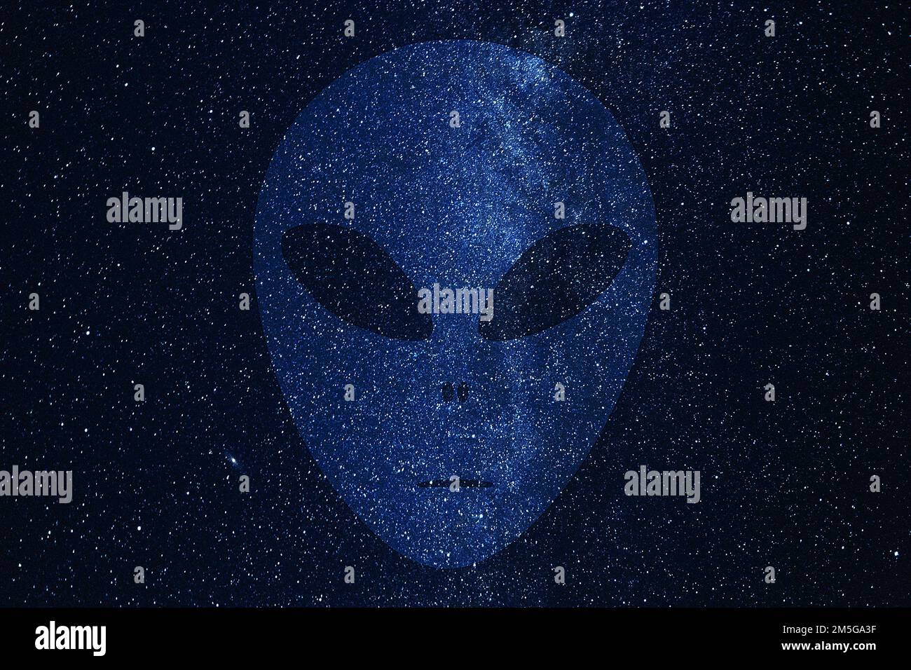 Alien face silhouette on background of starry sky Stock Photo - Alamy