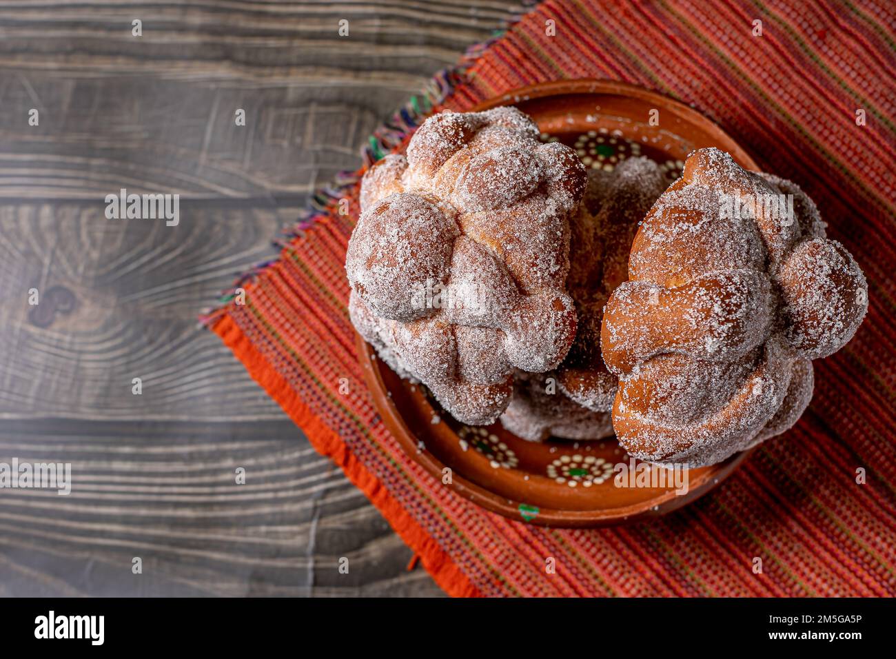 A top view closeup shot of a traditional bread of the dead of mexico ...