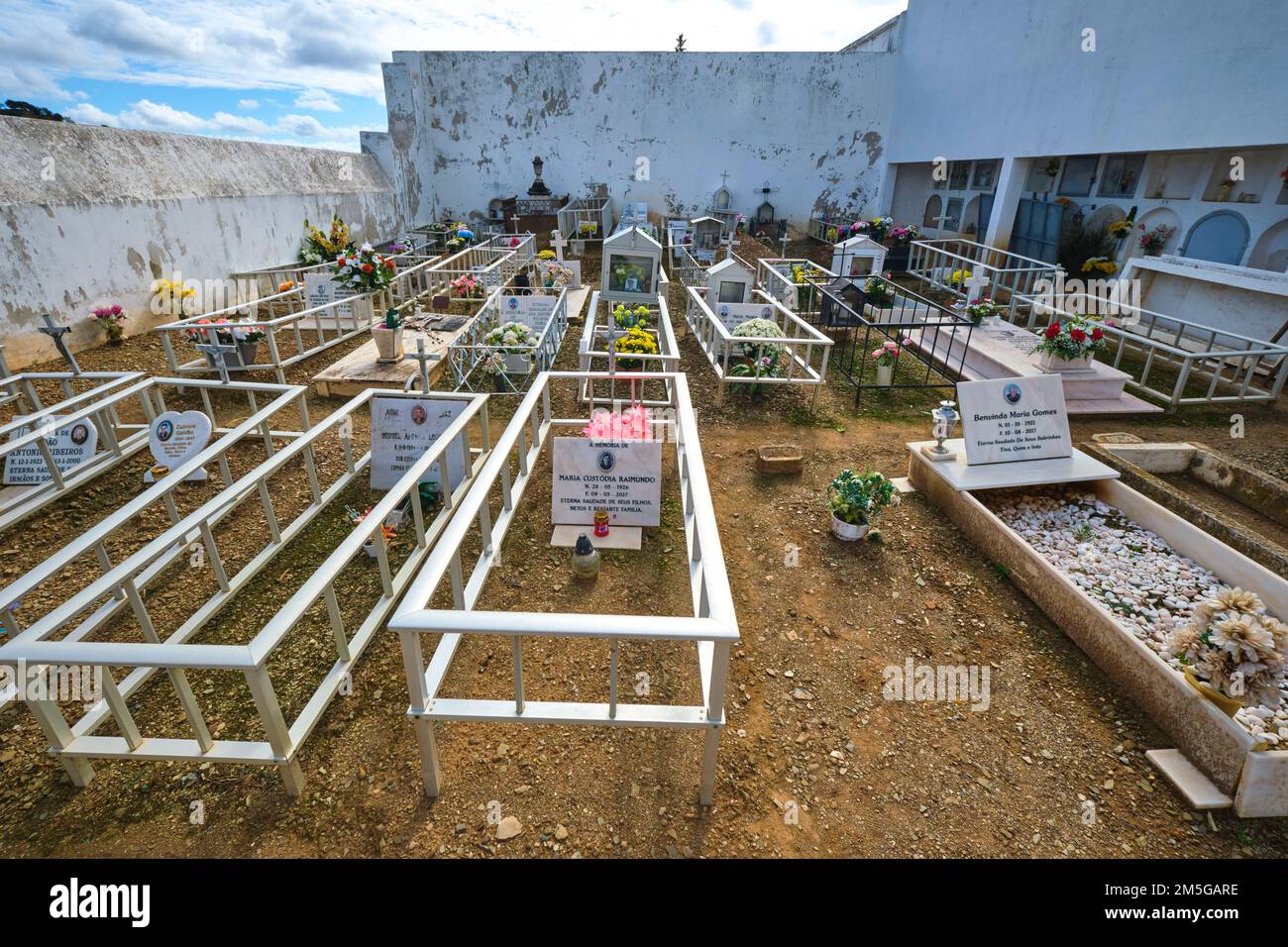 Various decorated tombs in a Catholic, christian cemetery. In the town ...