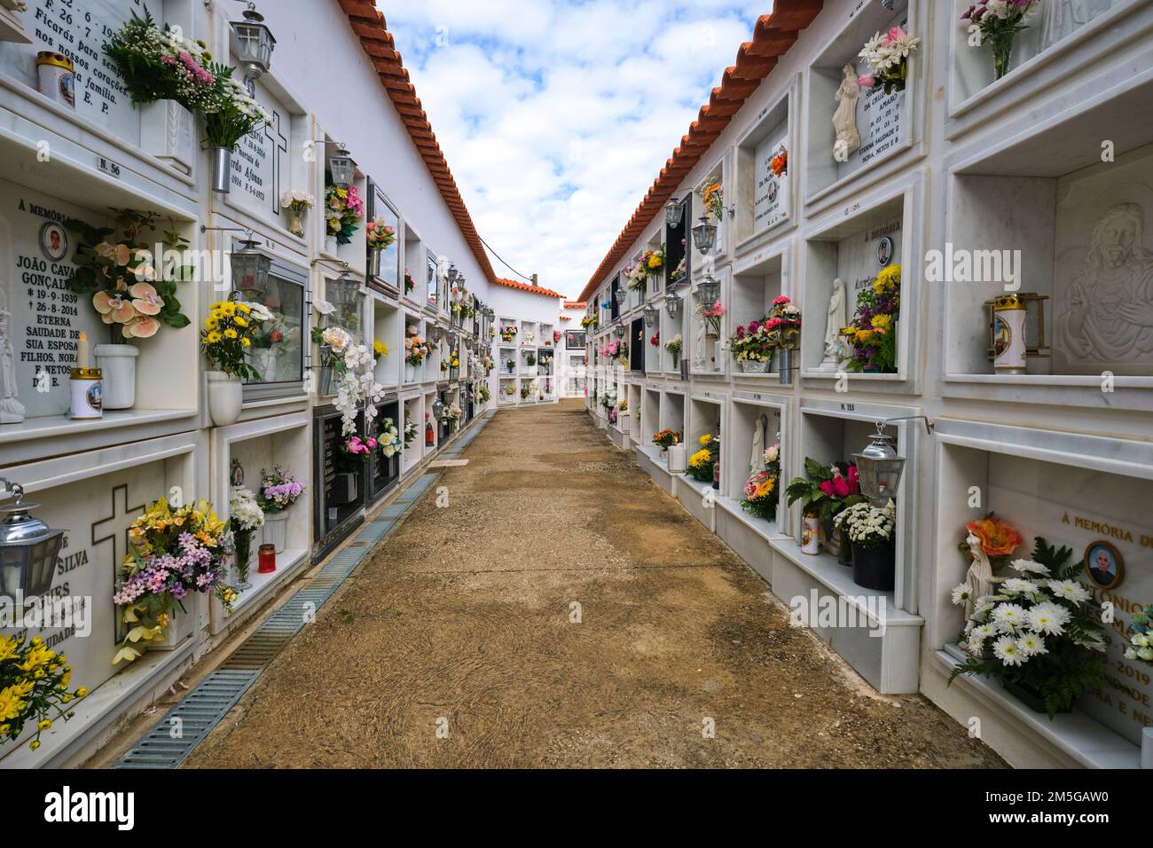 Various decorated tombs in a Catholic, christian cemetery. In the town ...