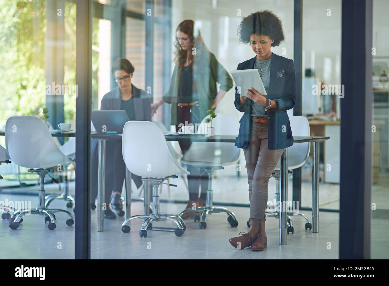 Strategising for success with technology. a young creative working on a ...