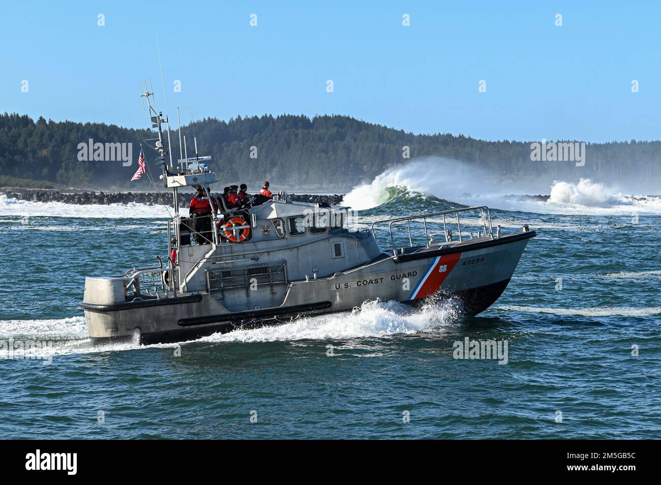 A 47-foot Motor Lifeboat from Coast Guard Station Coos Bay transits the ...
