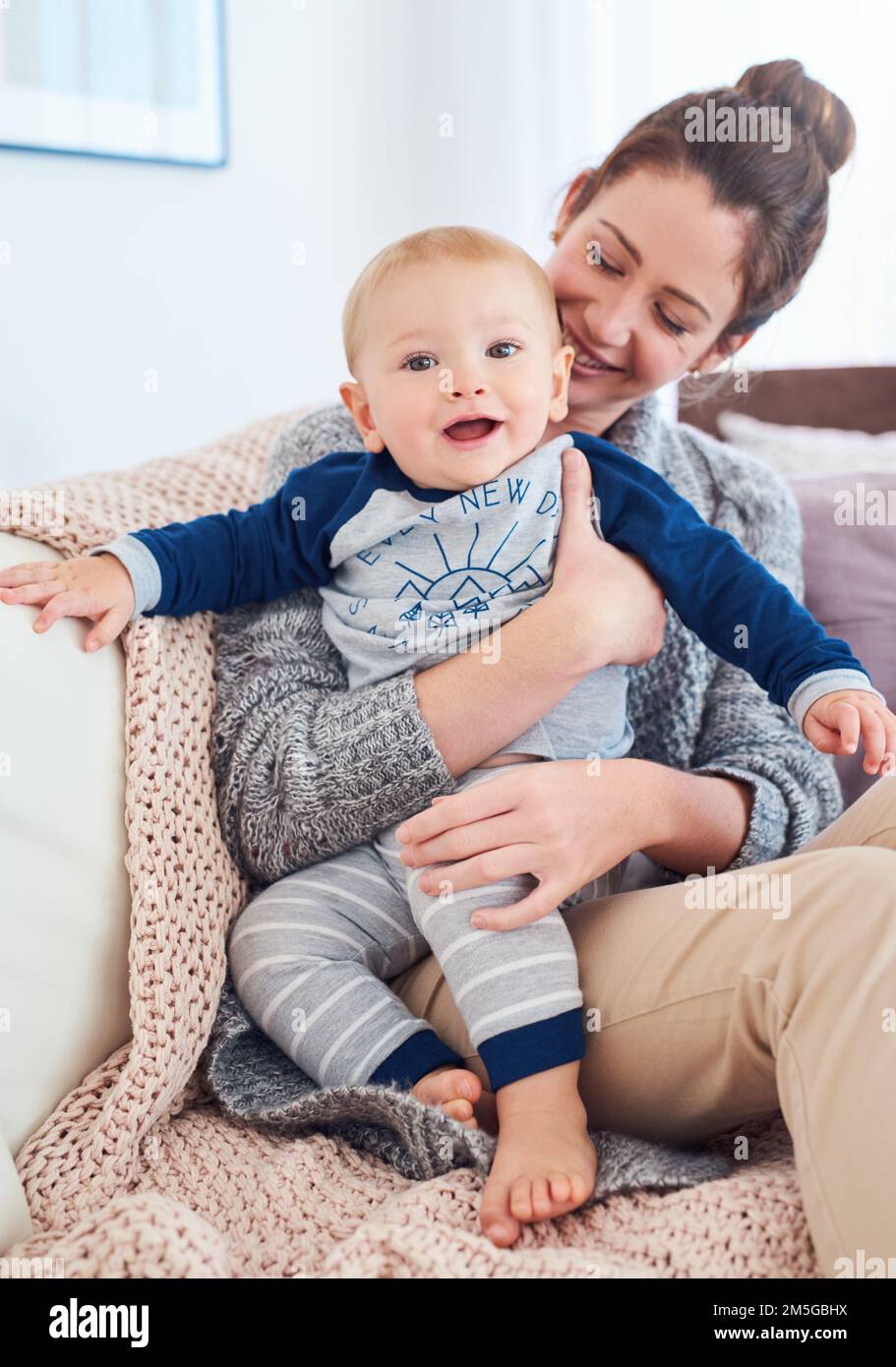 Im having so much fun with mum. Portrait of a baby boy bonding with his ...