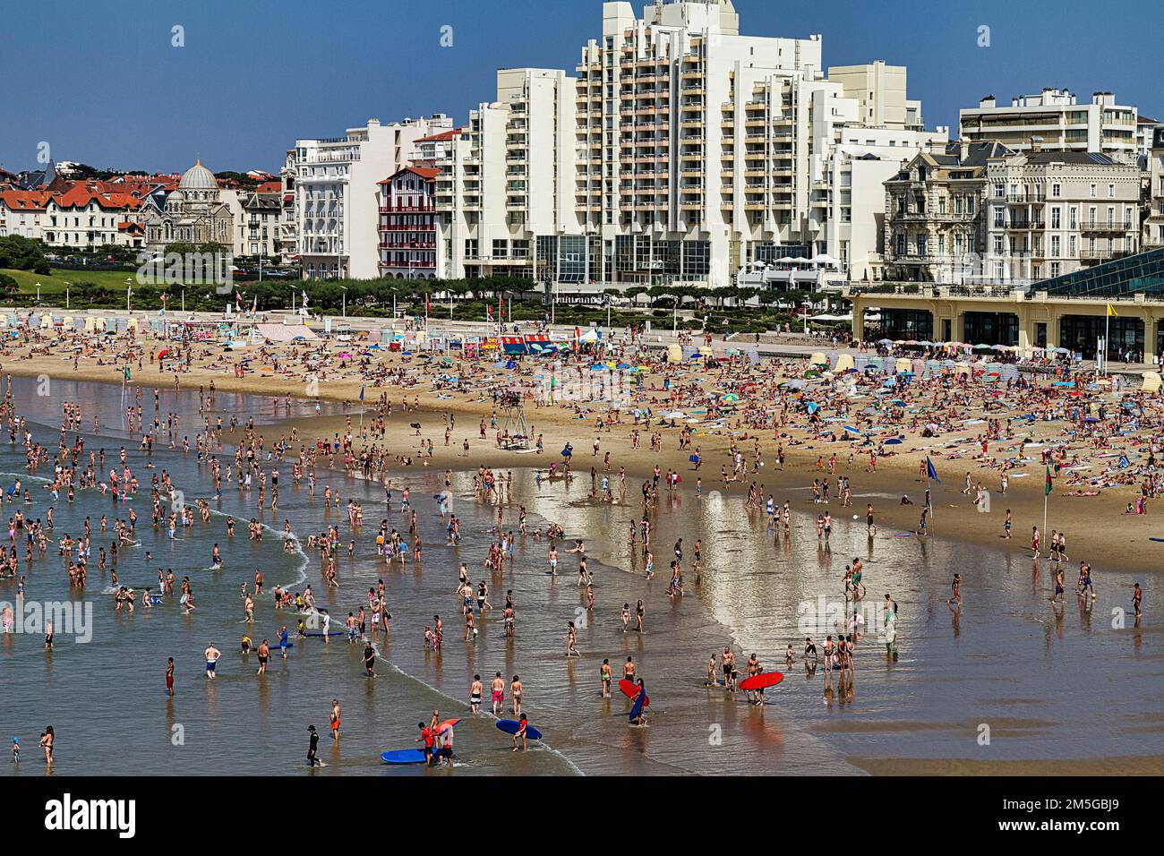 View from above of skyscrapers and crowds, strollers, tourists on the ...