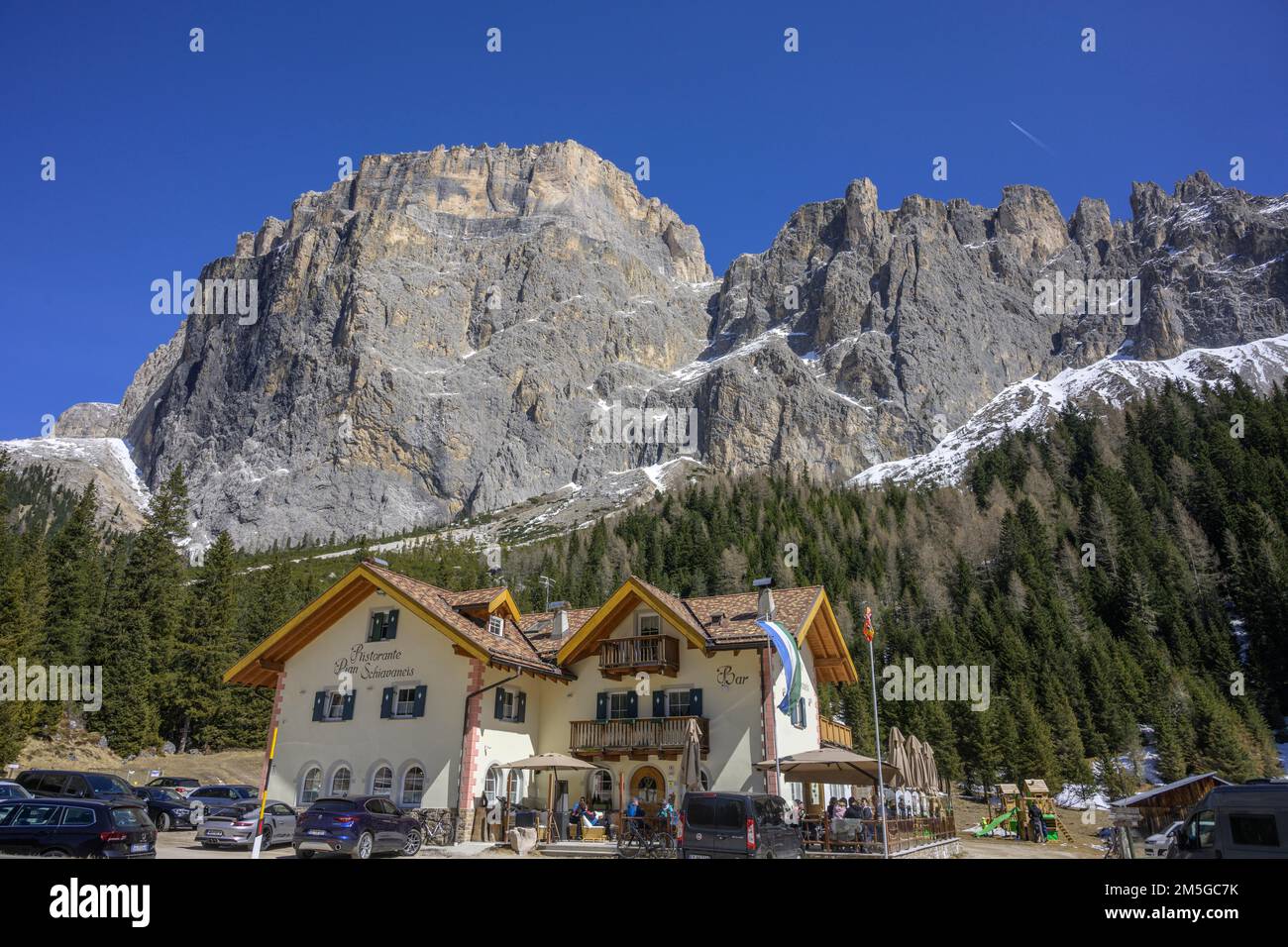 Pian Schiavaneis Restaurant and the walls of the Sella Group, Canazei ...