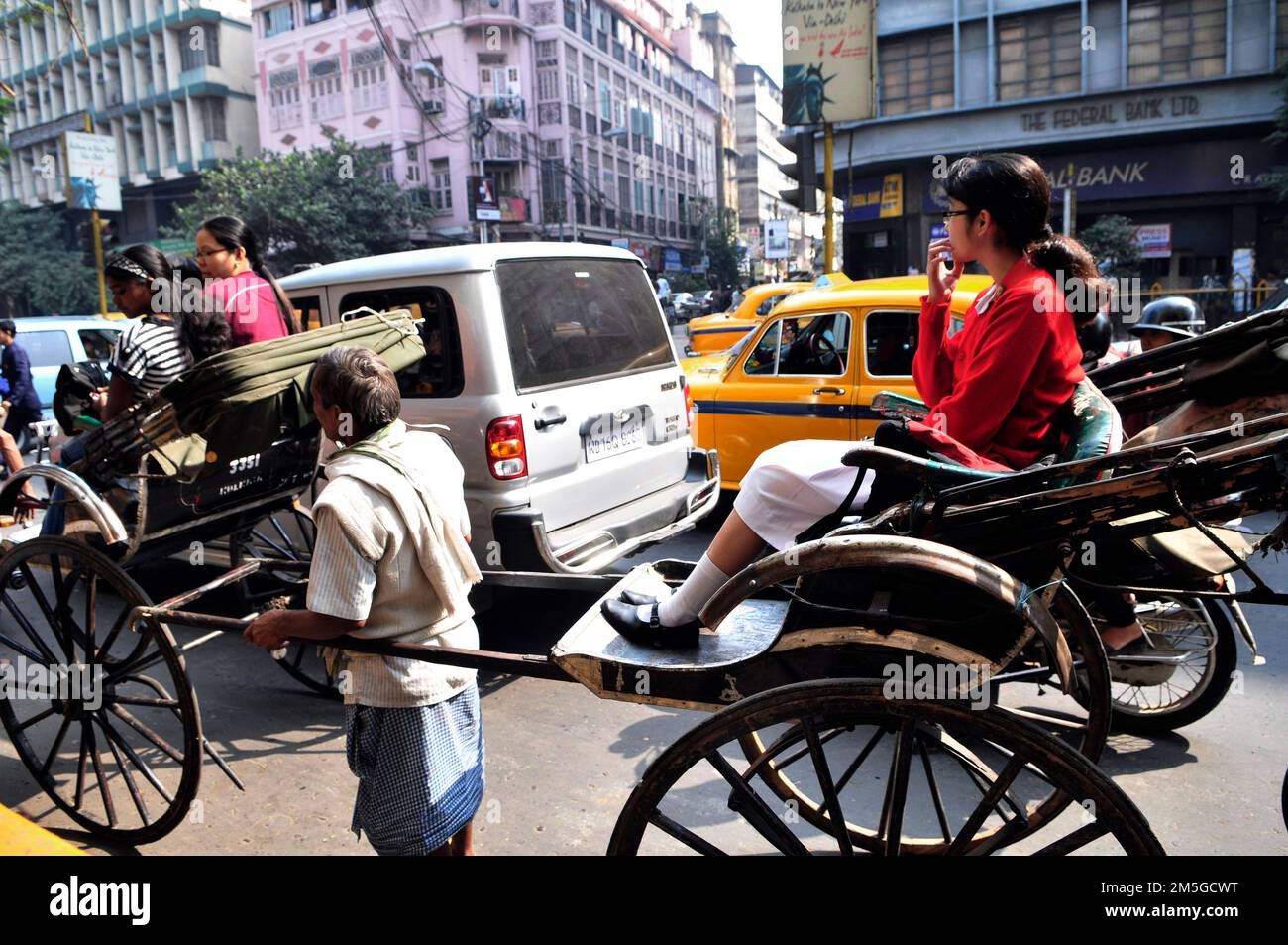 Hand pulled rickshaw in the streets of Kolkata, West Bengal, India ...
