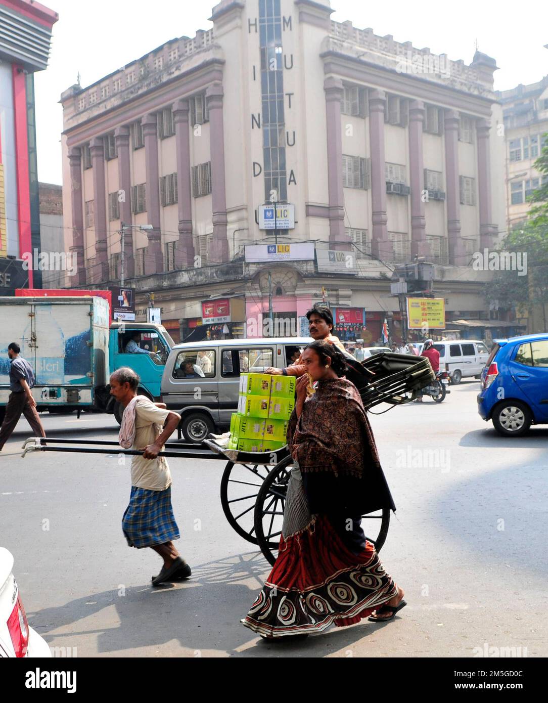 Hand pulled rickshaw in the streets of Kolkata, West Bengal, India ...