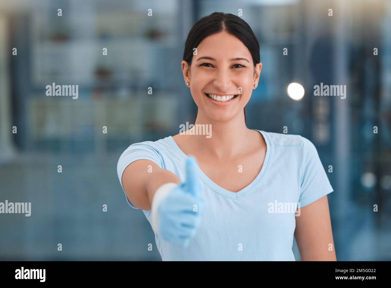 Cleaning woman, thumbs up portrait and office with smile, gloves and ...