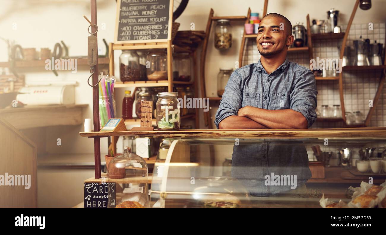 Living the entrepreneurs dream. an ambitious young small business owner ...