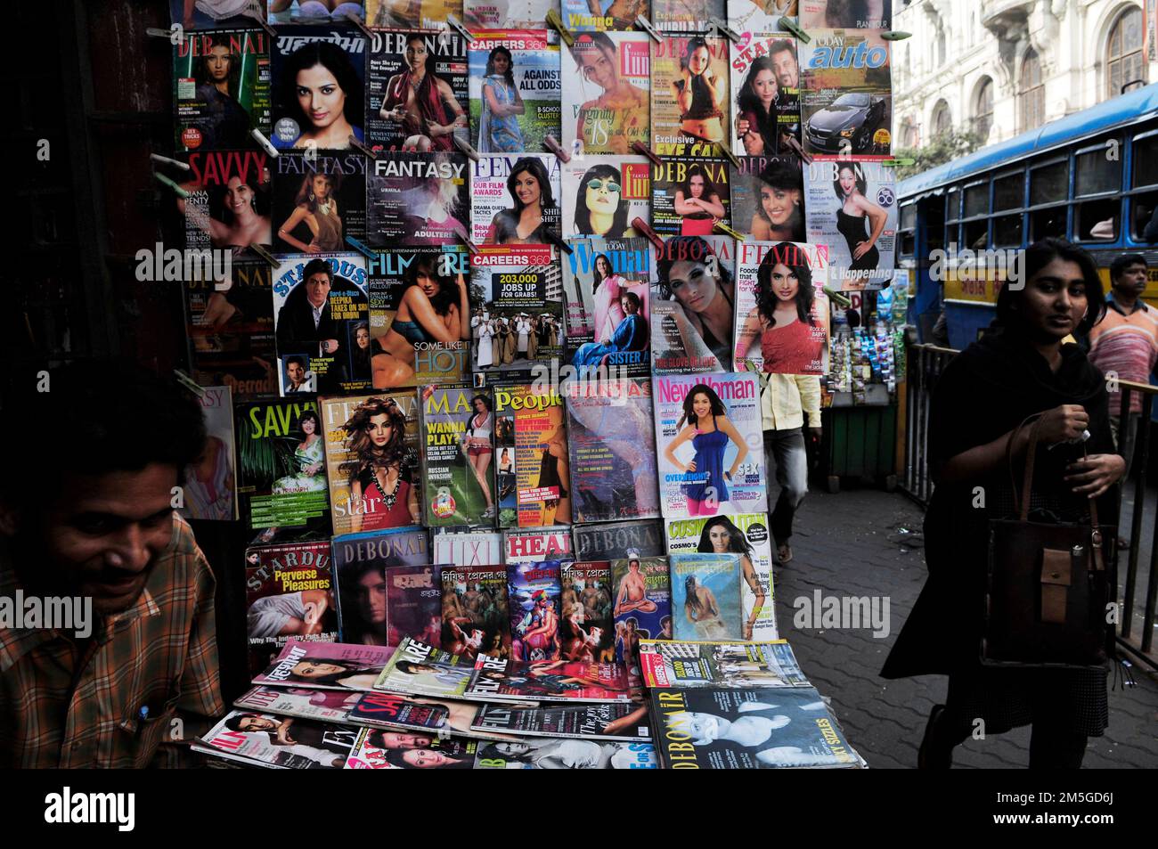 A magazine vendor in central Kolkata, India Stock Photo - Alamy