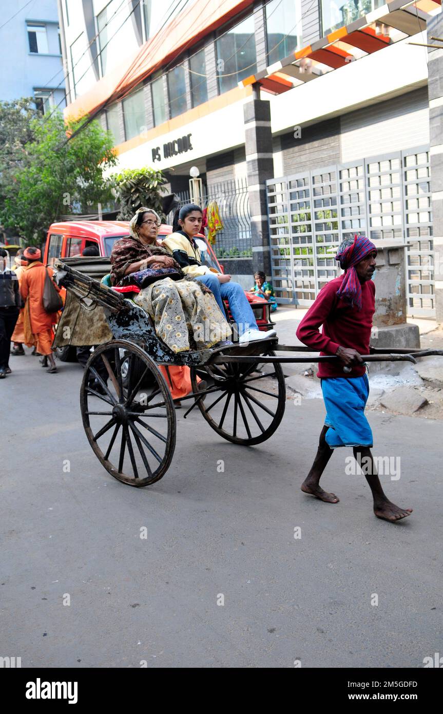 Hand pulled rickshaw in the streets of Kolkata, West Bengal, India ...