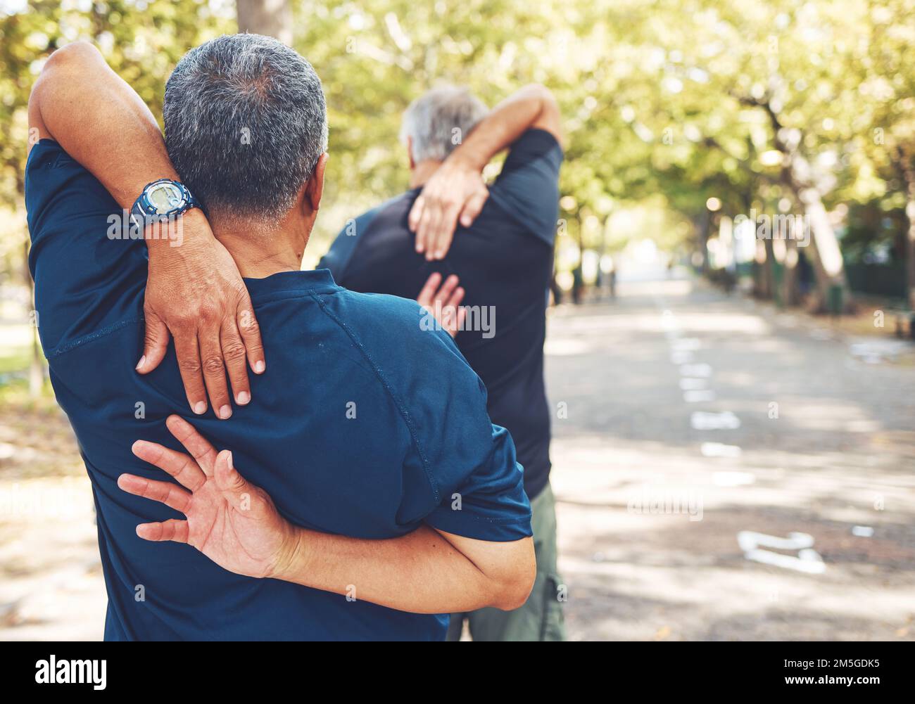 Fitness, elderly men and stretching in park, ready for running and ...