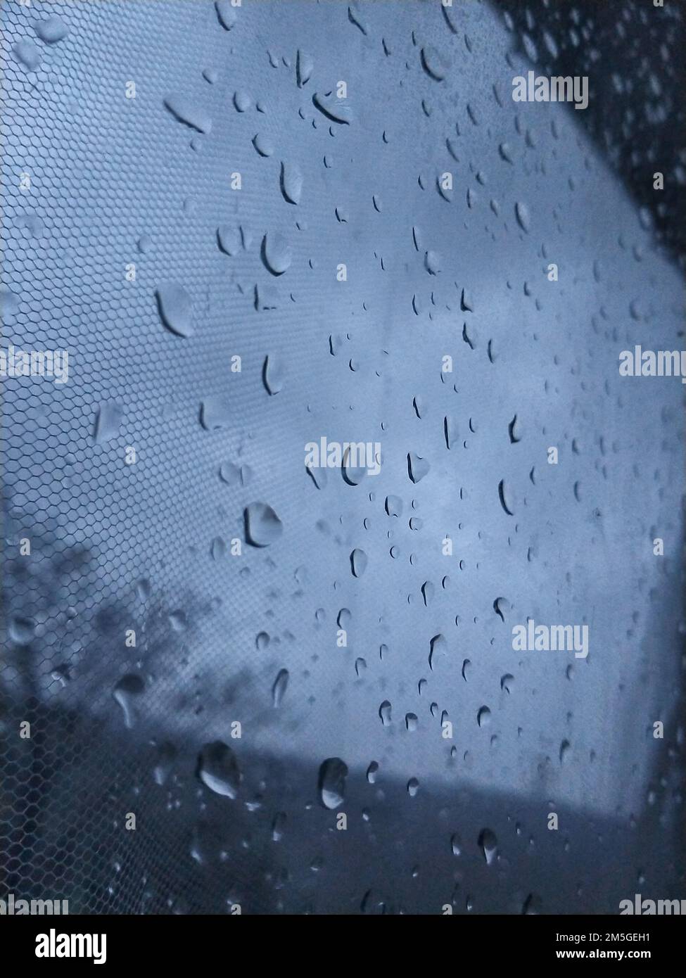 window with rain droplet in a winter cold day. window raindrops Stock ...