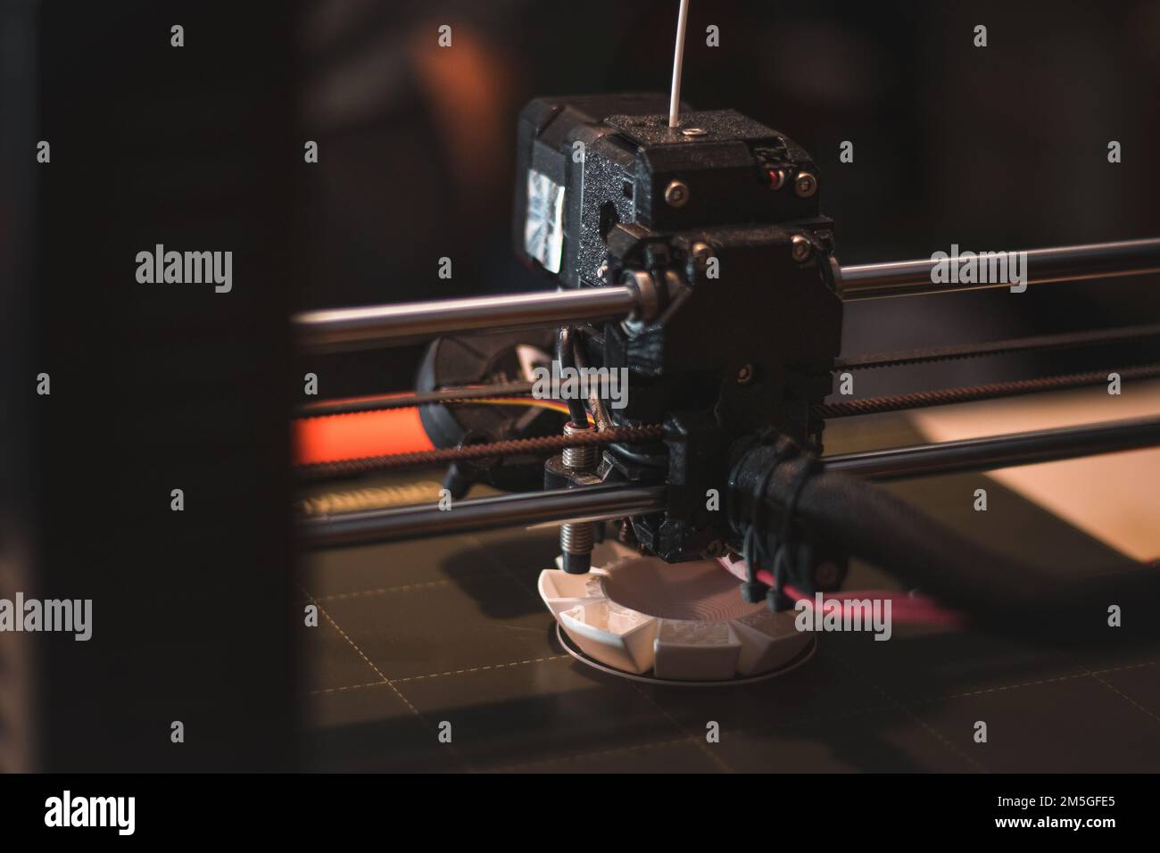 Technological hi-teg tool for making new things. A black and red 3D ...