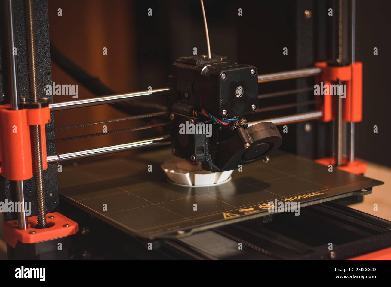 Technological hi-teg tool for making new things. A black and red 3D ...