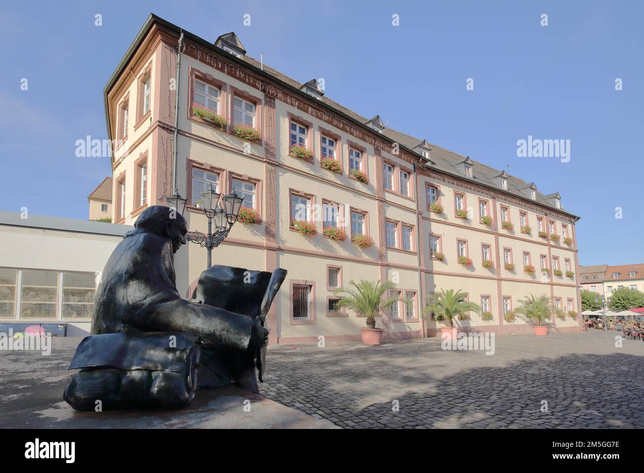 Baroque Town Hall and sculpture The Newspaper Reader by Franz Werner ...