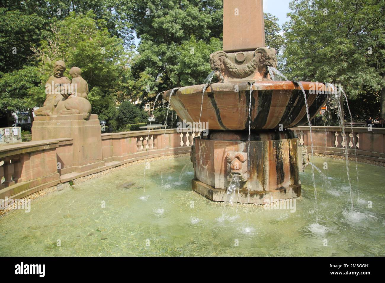 Detail on the Kurfuerstenbrunnen or obelisk fountain with water basin ...