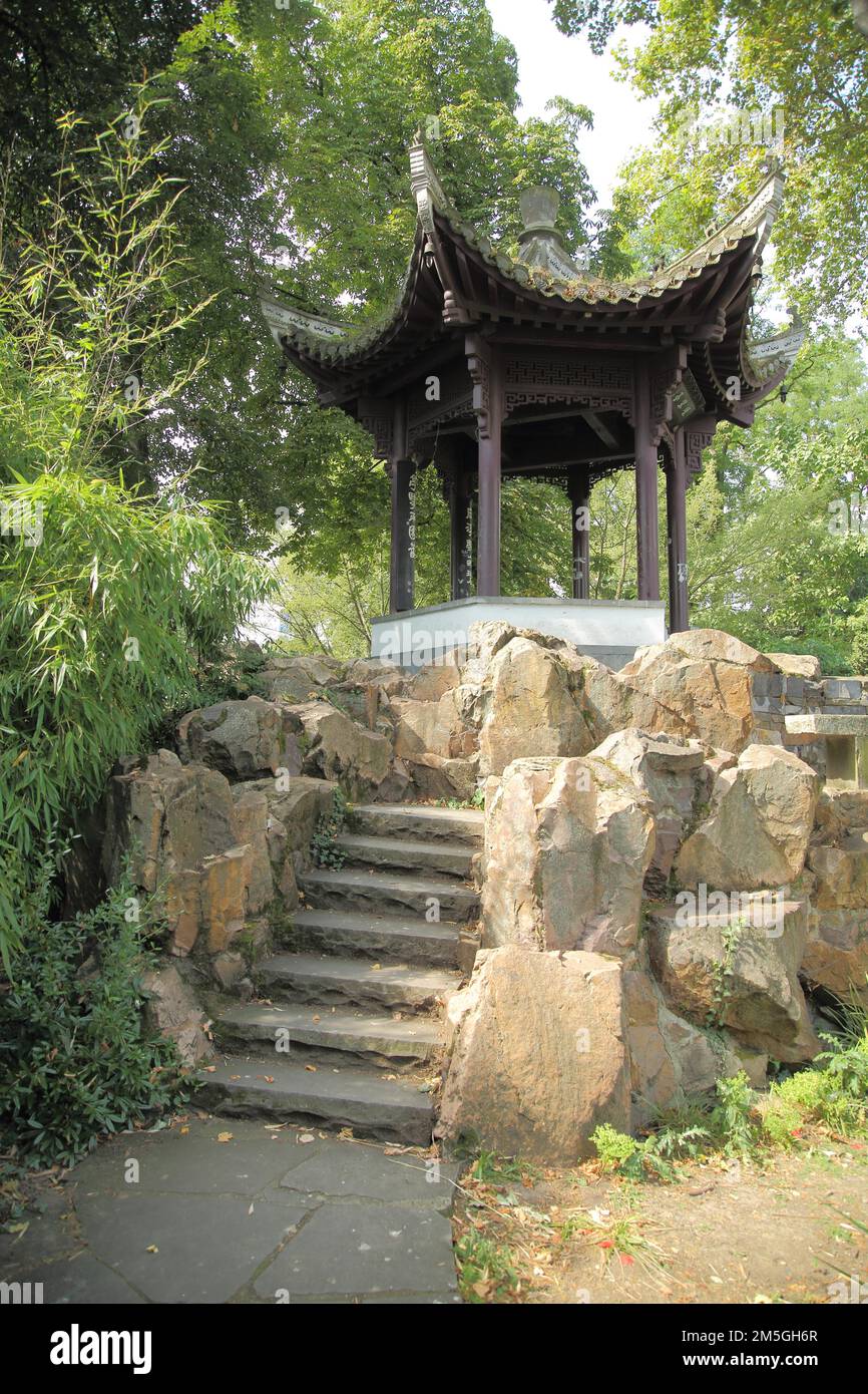 Temple with stairs in the Chinese Garden, Garden of Heavenly Peace ...