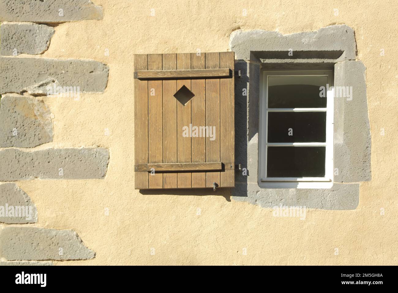 Facade with window, shutter and hatch at the historic cowherd's tower ...