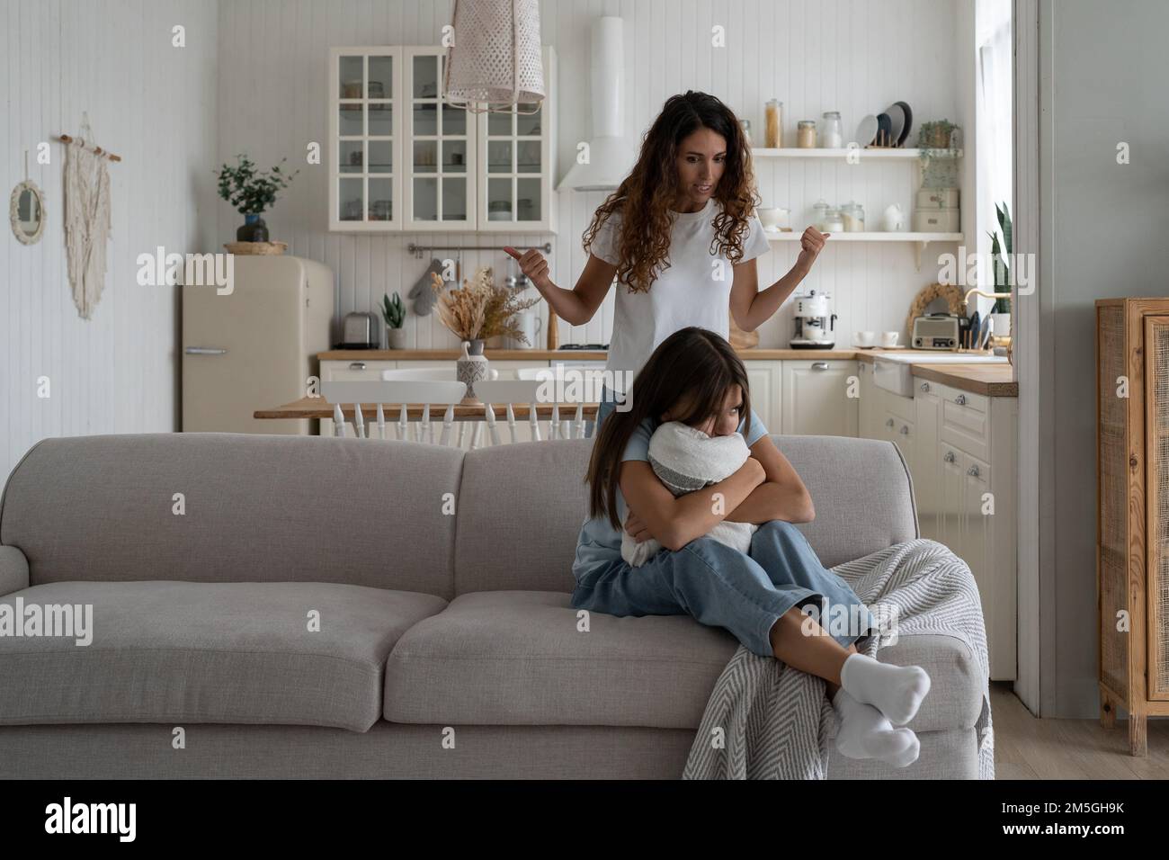 Angry woman mother blaming scolding sad girl daughter at home, dealing ... Angry woman mother blaming scolding sad girl daughter at home, dealing ...