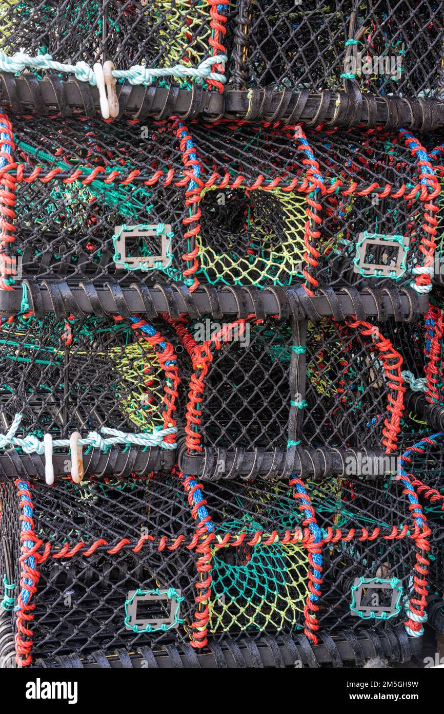 Brand new crab fishing traps stacked on a key Stock Photo - Alamy