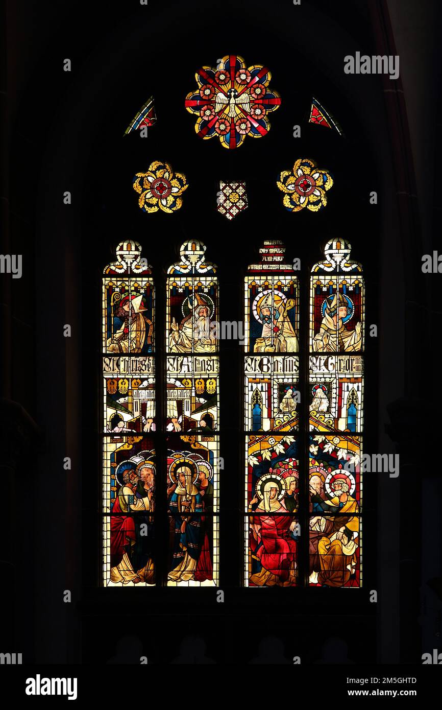 Interior view with colourful window of the neo-Gothic St. Peter's ...